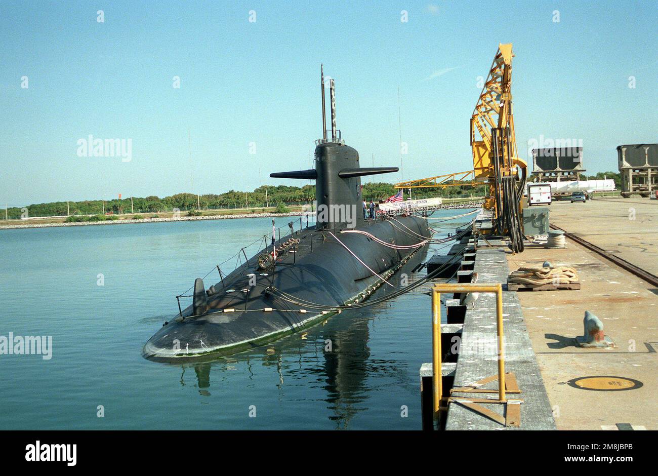 A port bow view of the nuclear-powered ballistic missile submarine USS ...