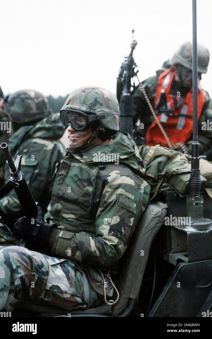 U.S. Marines stand by in a M-151 multi-utility tactical truck (MUTT ...