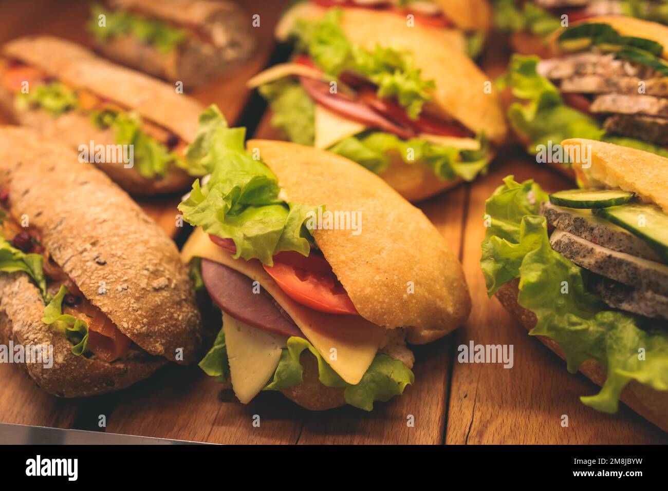 Beautifully decorated catering banquet table with different food snacks ...