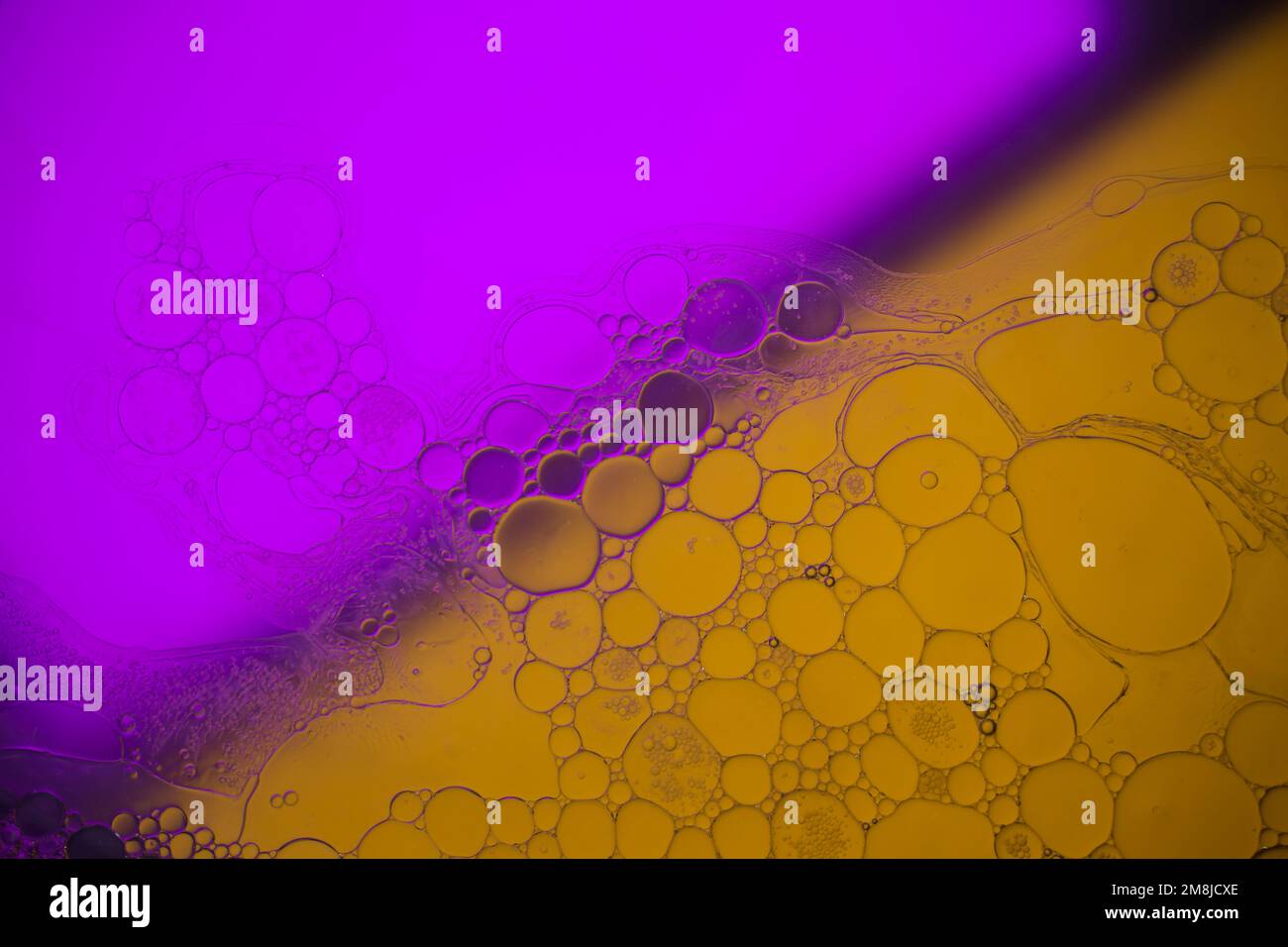 Top view movement of oil bubbles in the liquid. Oil surface ...