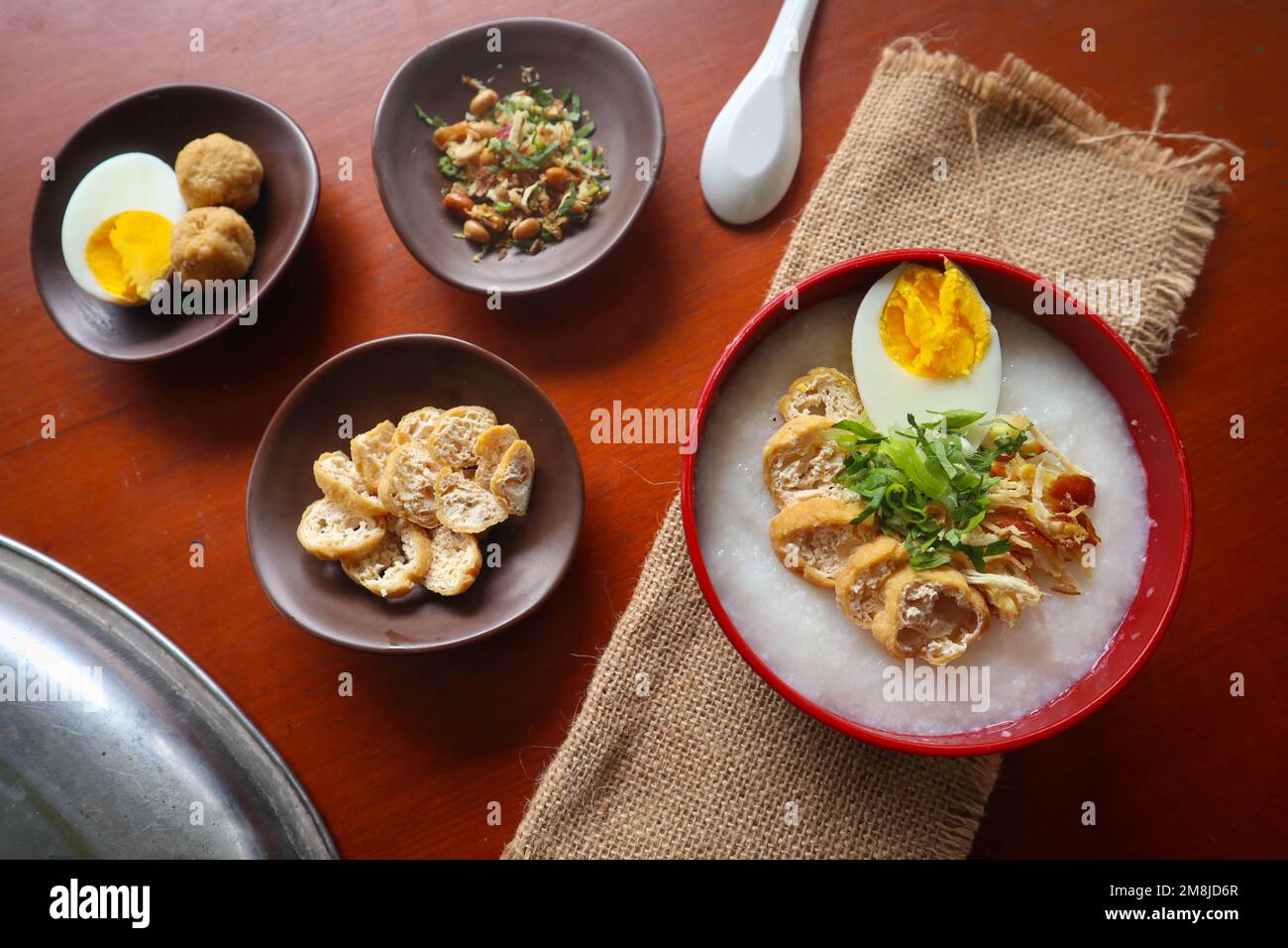congee porridge with chicken slice, tofu, egg. congee porridge from ...