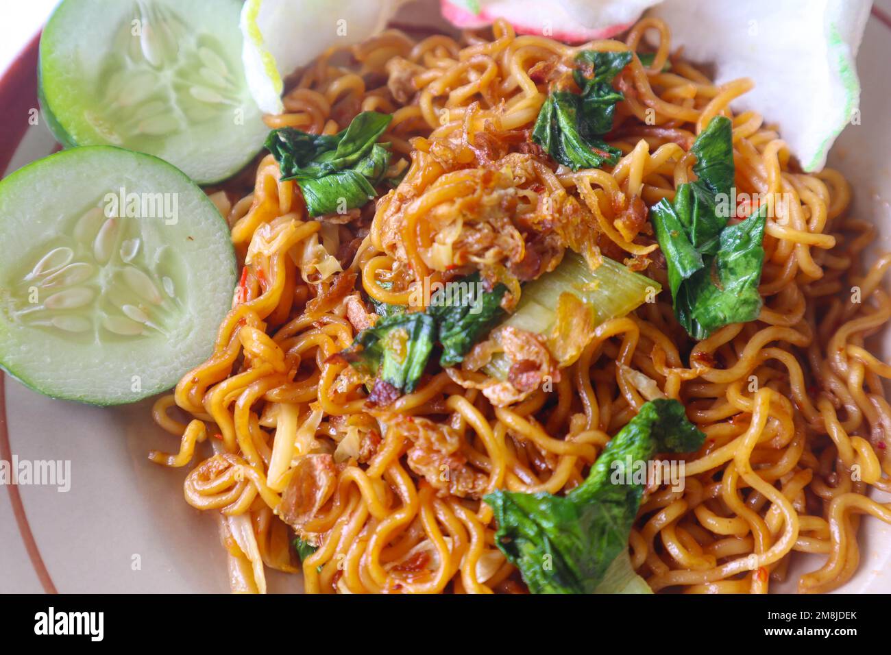 mie tek tek or fried noodle made with egg noodles with chicken, cabbage ...