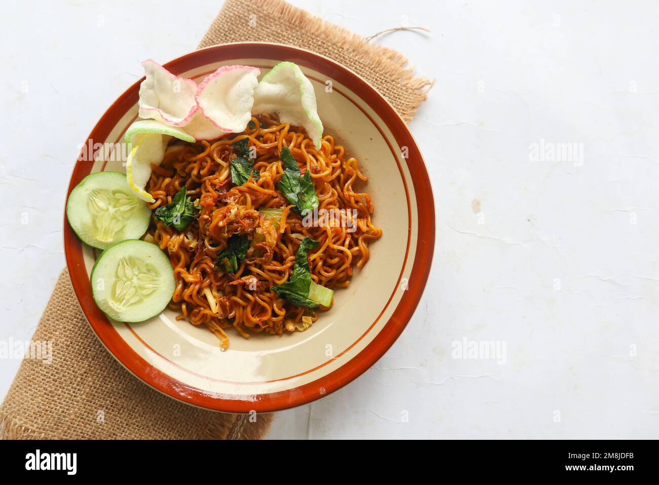 mie tek tek or fried noodle made with egg noodles with chicken, cabbage ...