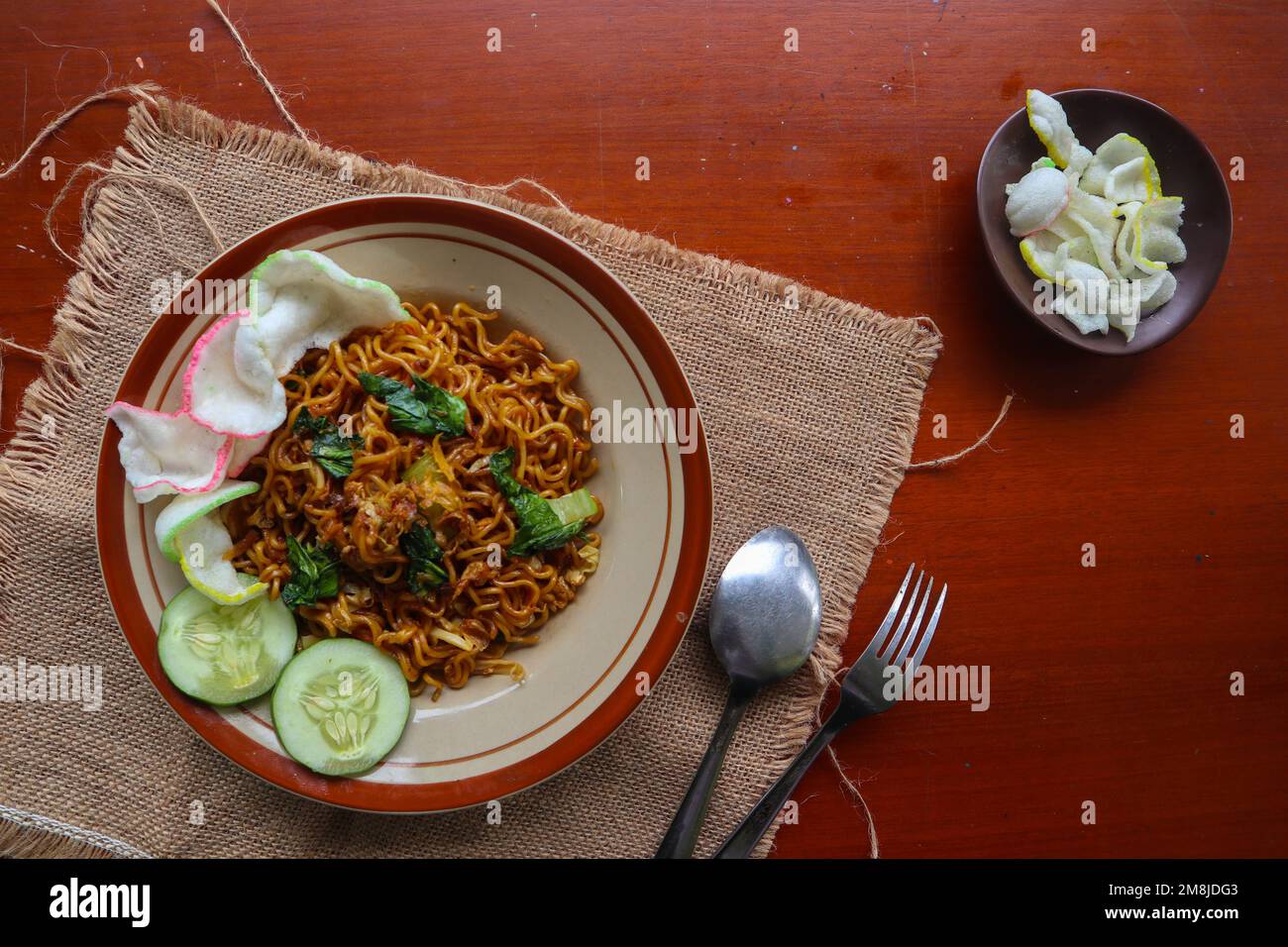 mie tek tek or fried noodle made with egg noodles with chicken, cabbage ...