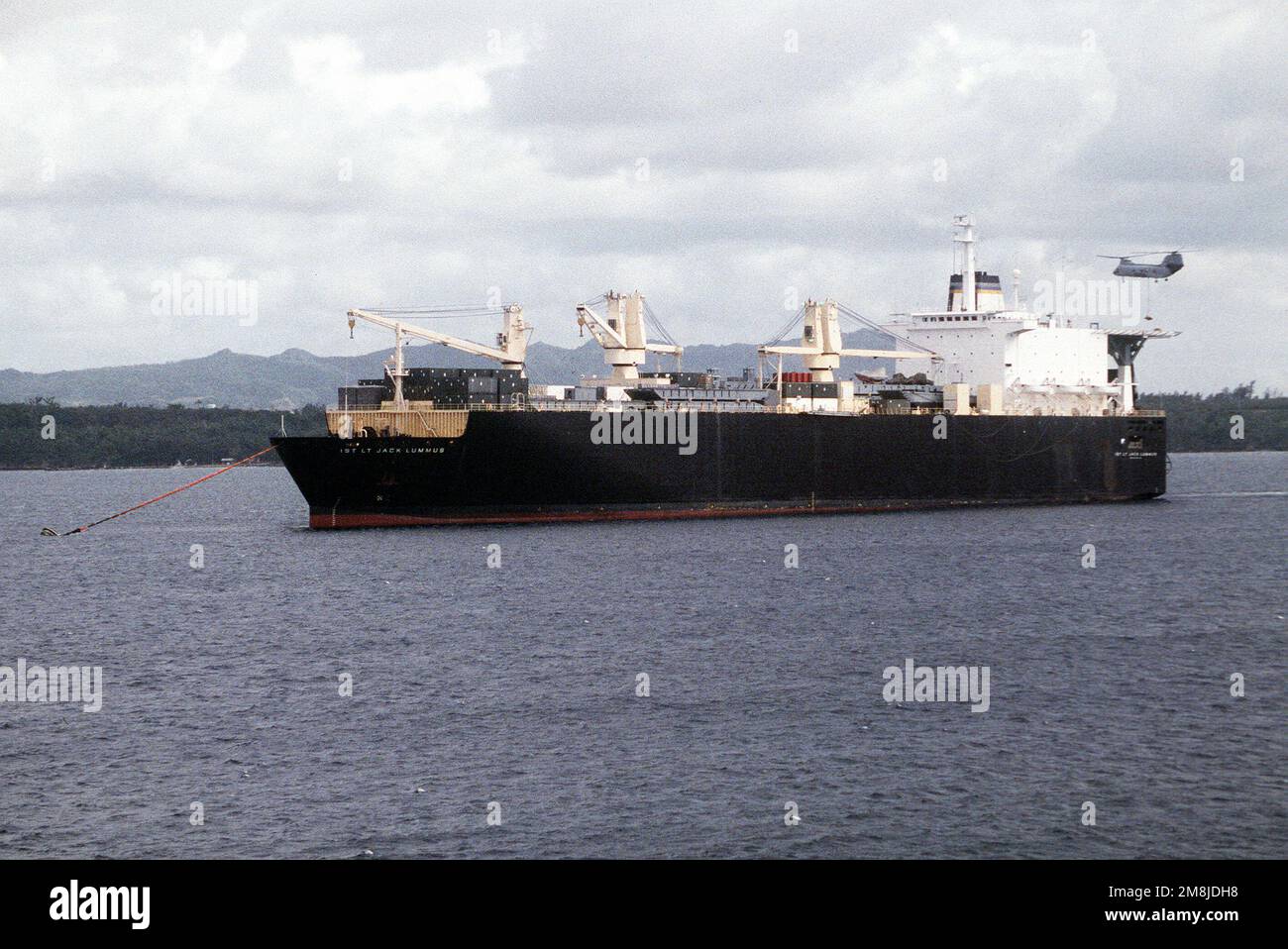 A port bow view of the Military Sealift Command (MSC) chartered ...