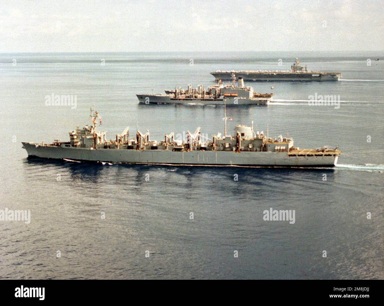 The combat support ship USS CAMDEN (AOE-2) and the nuclear-powered ...