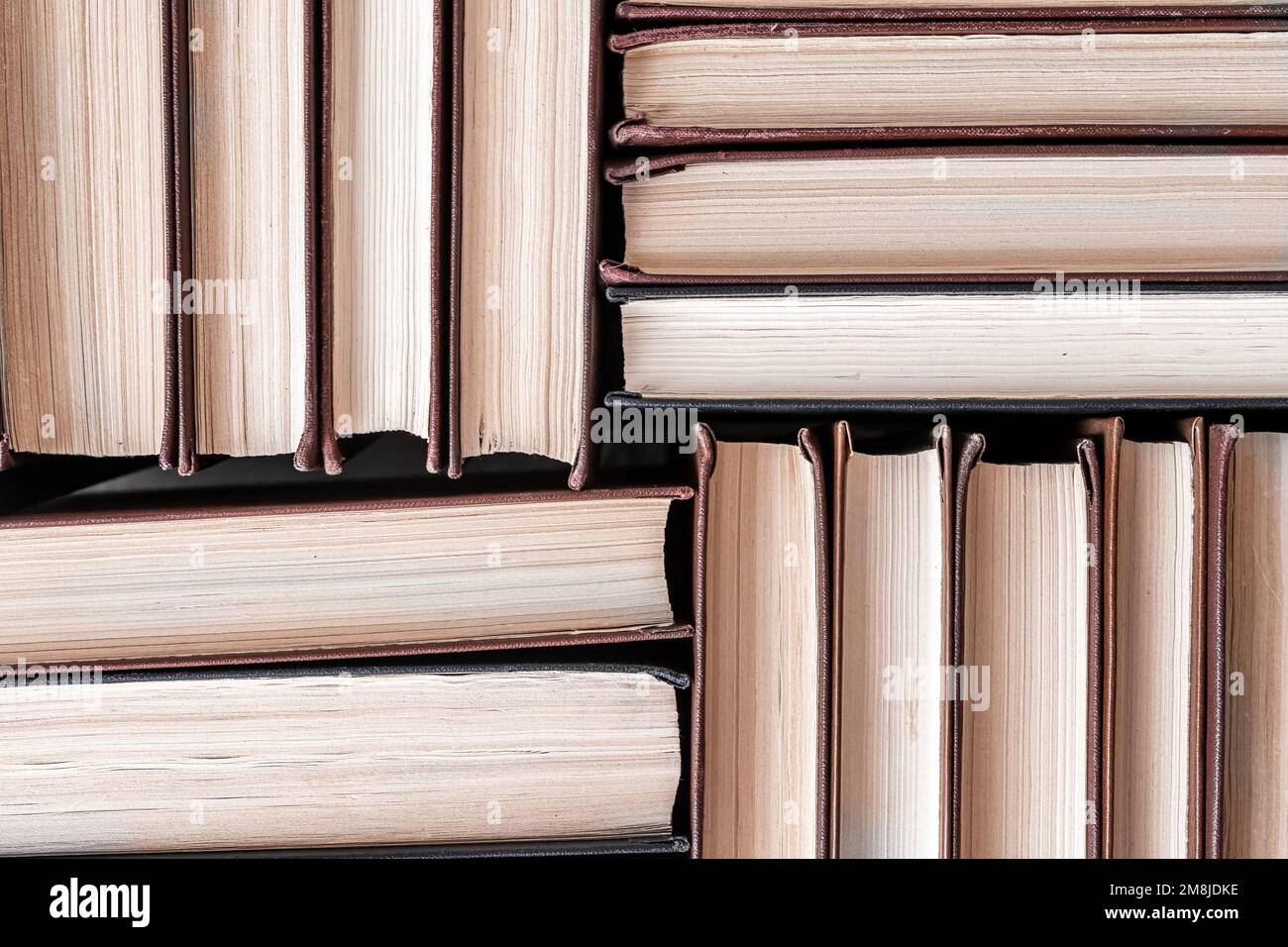 Classic books stacked in groups closeup. Study, library, knowledge ...