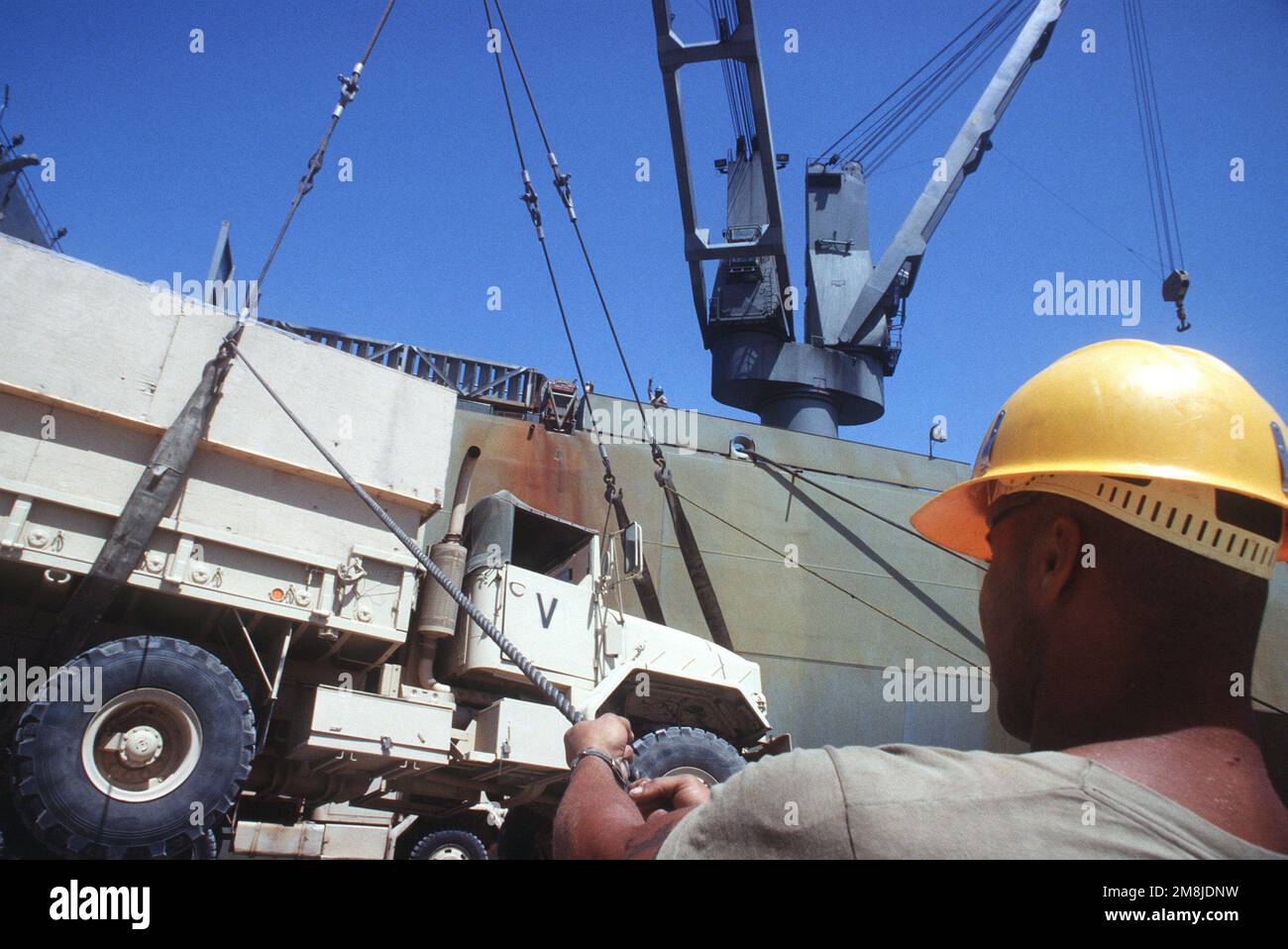 The 155th Transportation Company, Fort Eustis, VA, load an M9A9 5-ton ...