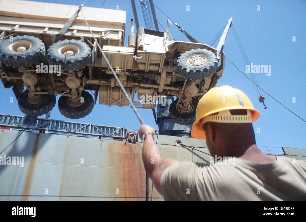 The 155th Transportation Company, Fort Eustis, VA, load an M9A9 5-ton ...
