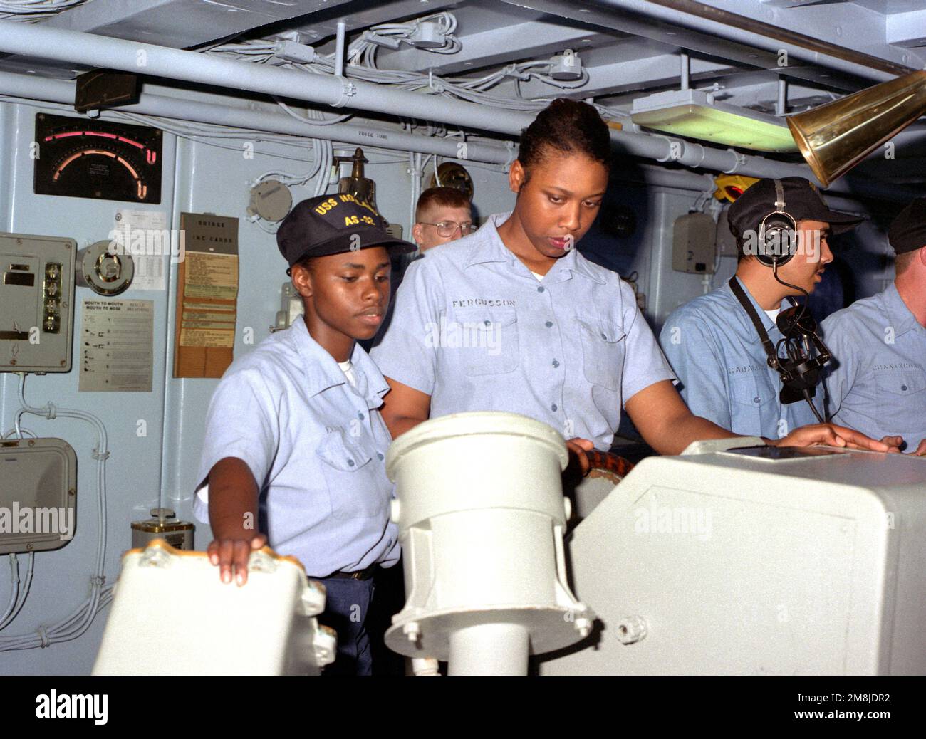 Members of the bridge crew of the submarine tender USS HOLLAND (AS-32 ...