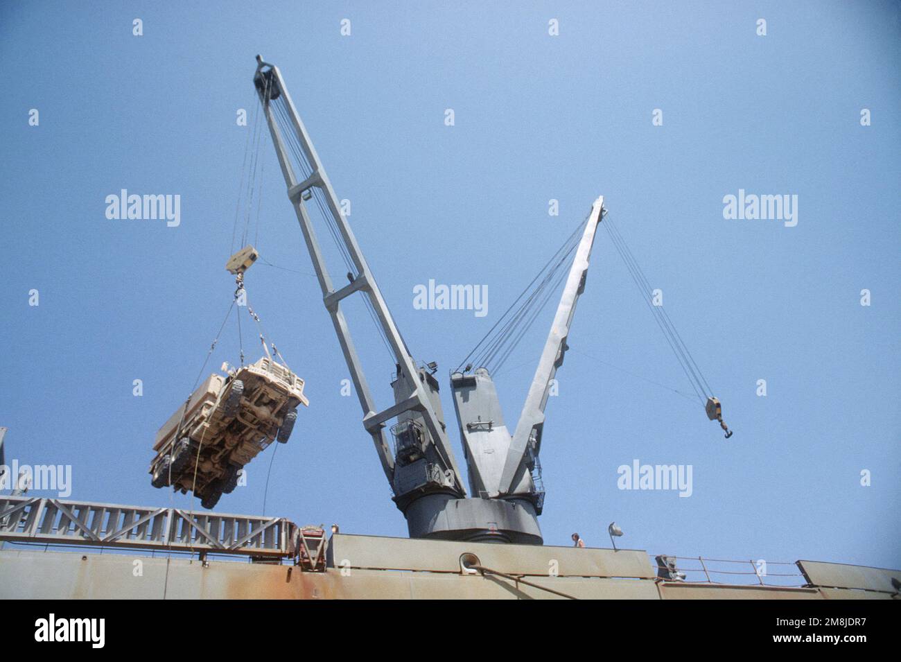 The 155th Transportation Company, Fort Eustis, VA, load an M9A9 5-ton ...