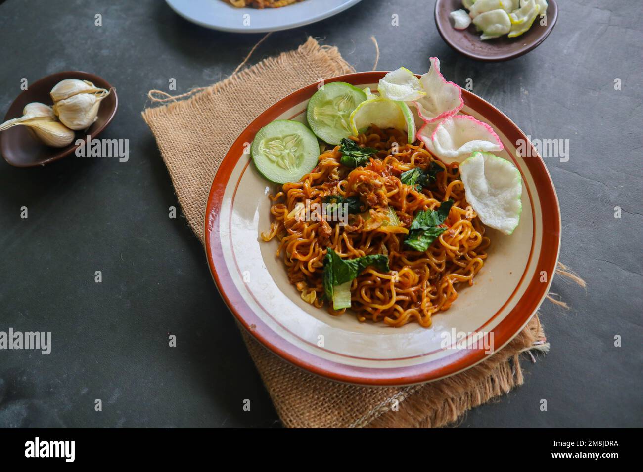 mie tek tek or fried noodle made with egg noodles with chicken, cabbage ...