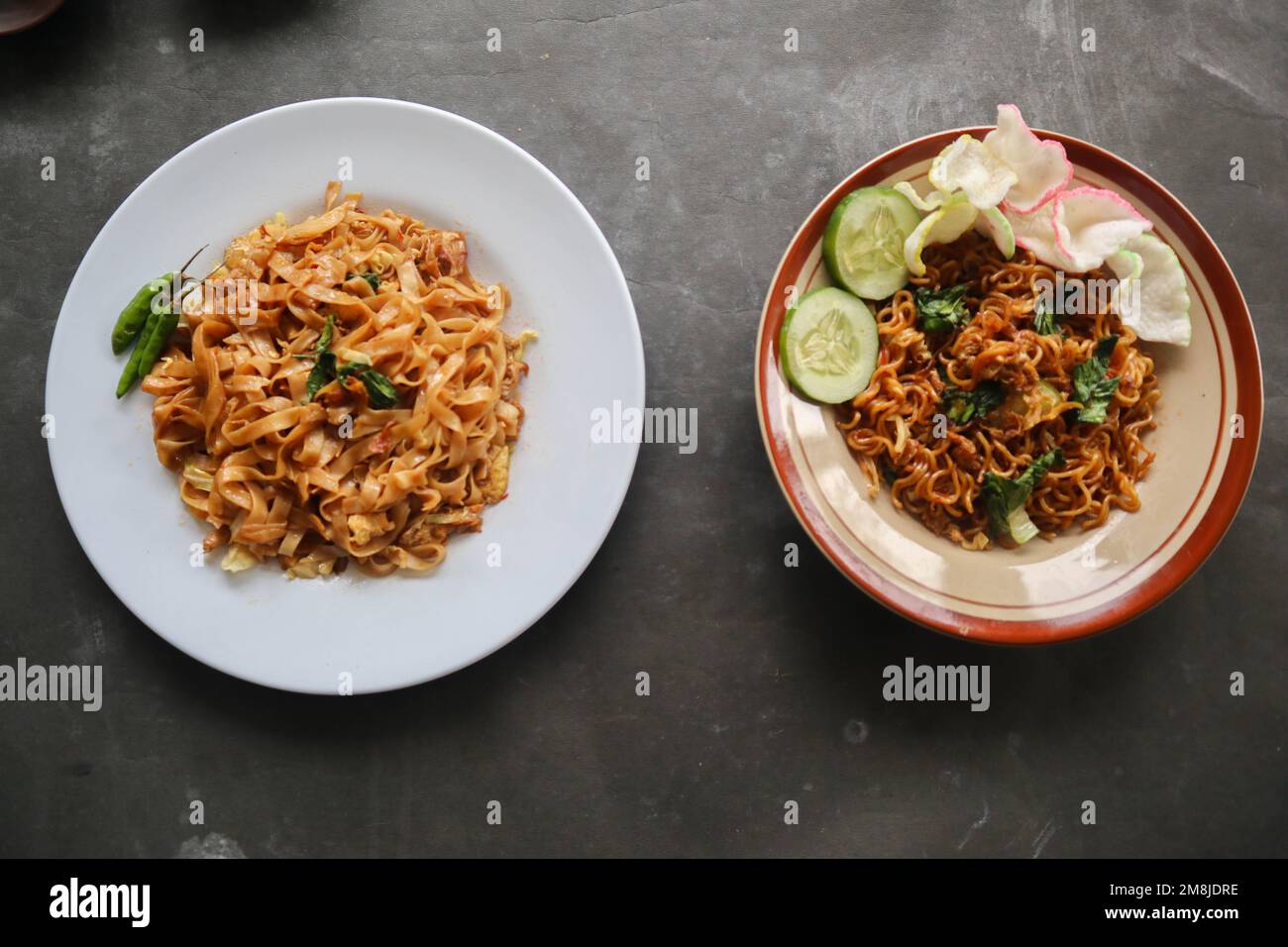 Kwetiau goreng is Chinese Indonesian stir fried flat rice noodle dish ...