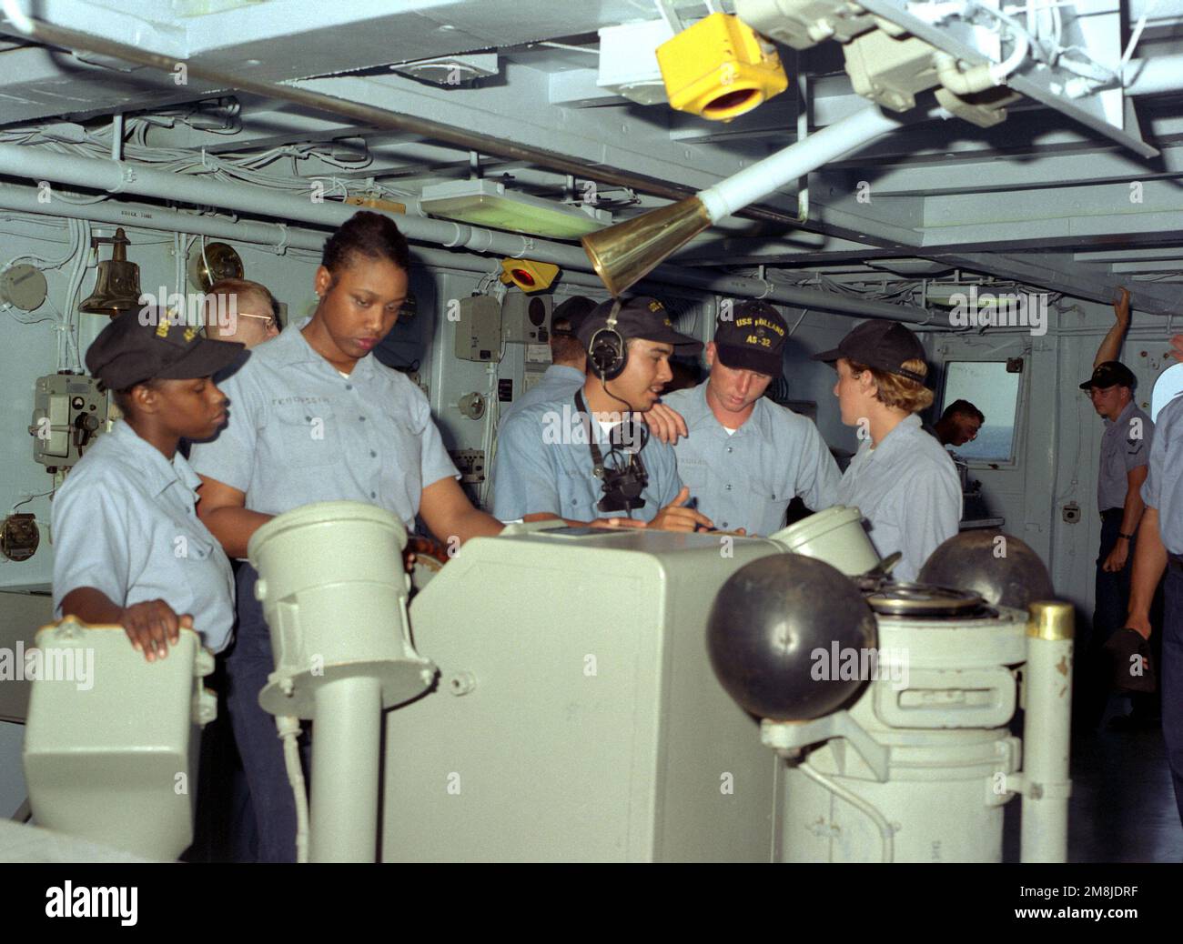 Members of the bridge crew of the submarine tender USS HOLLAND (AS-32 ...