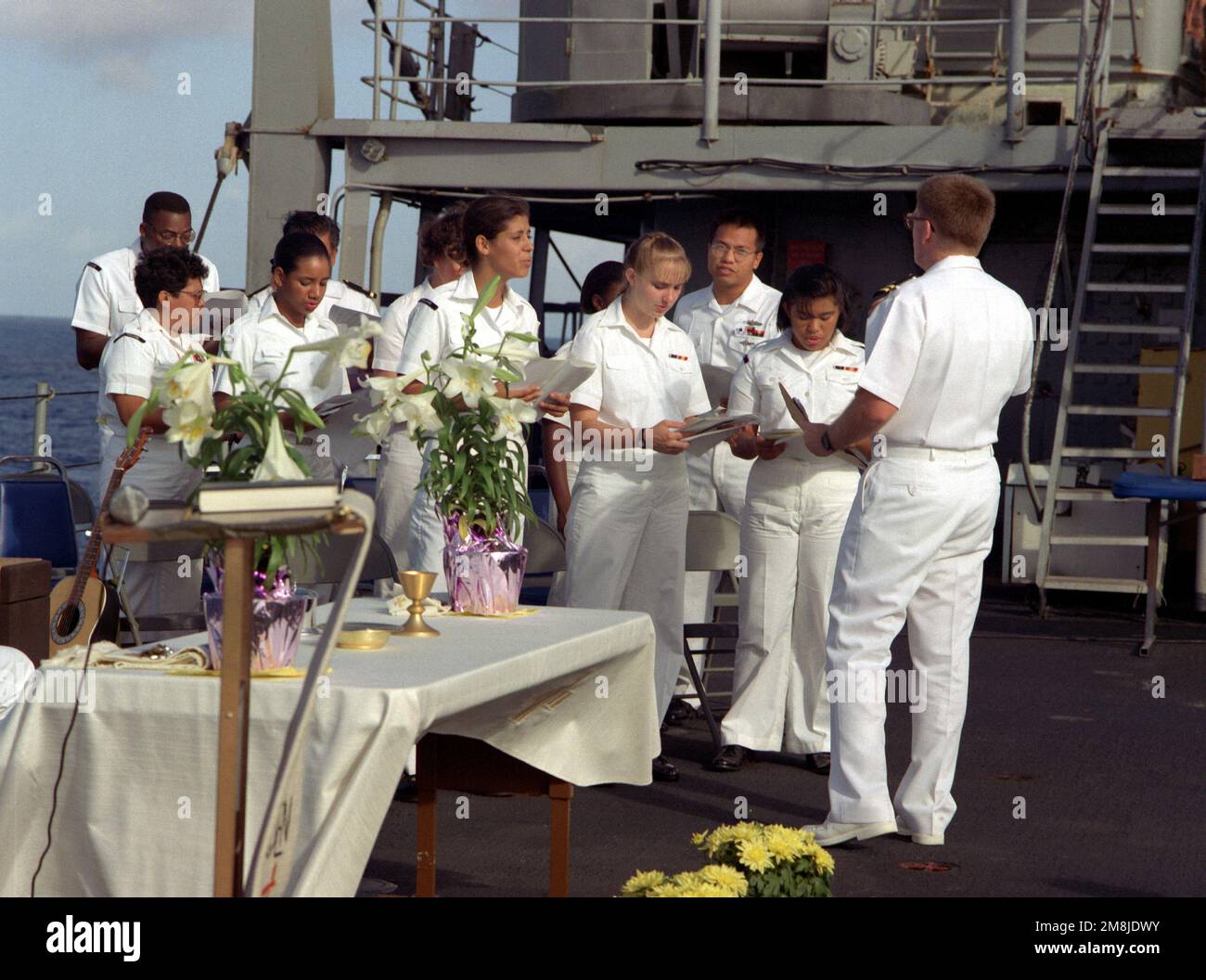 The chaplain of the submarine tender USS HOLLAND (AS-32), LT. Benjamin ...