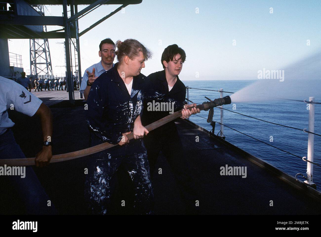 Machinist Mate Third Class (MM3) Michelle McCranie (left), who just ...