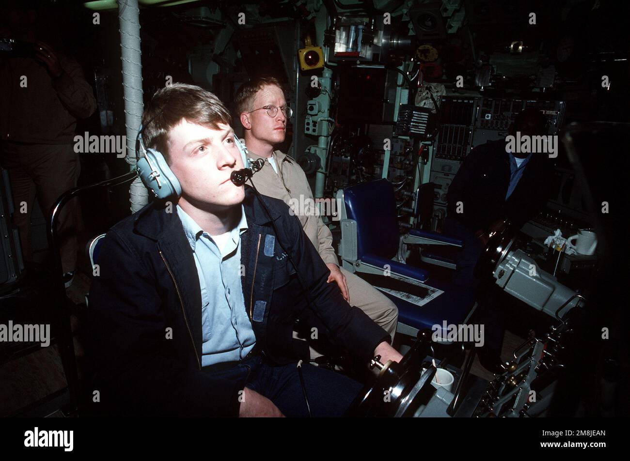 Torpedoman Third Class (TM3) Kenneth Wichlan and LT. David Post stand ...