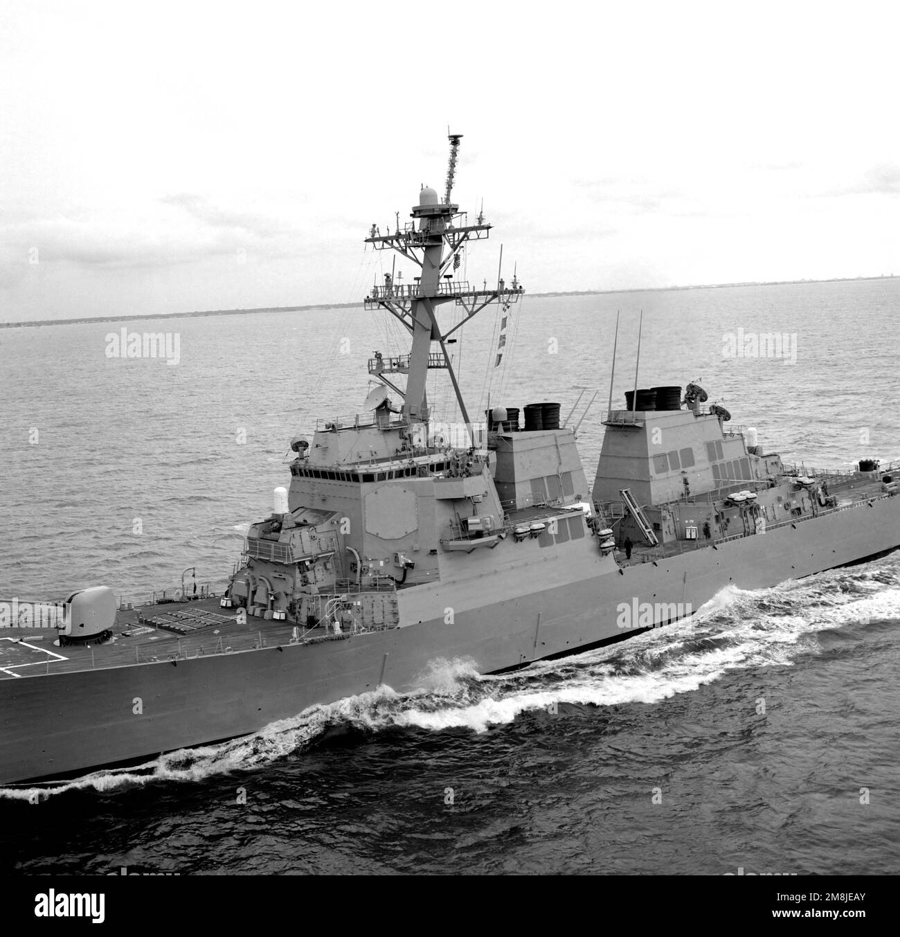 Close in port bow view of the guided missile destroyer USS ARLEIGH BURKE (DDG-51) underway off ...