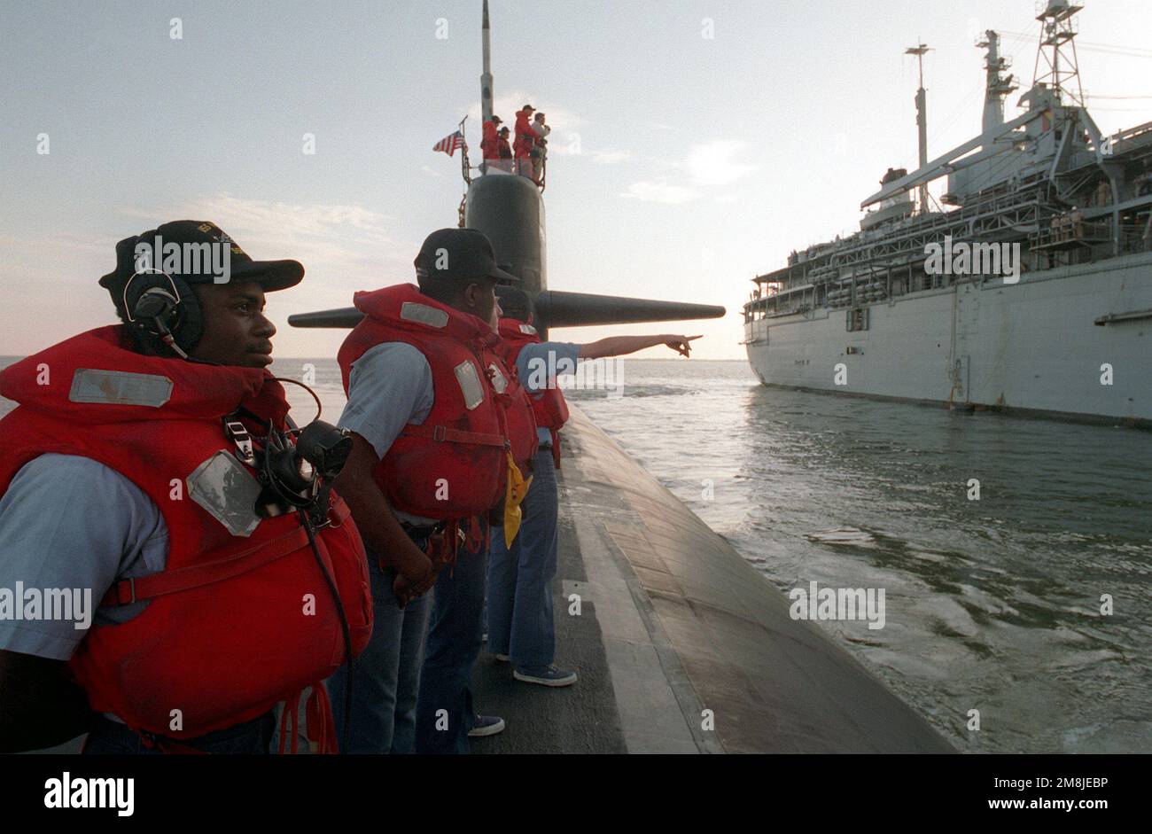 Crewmembers of the deck force of the nuclear-powered attack submarine ...