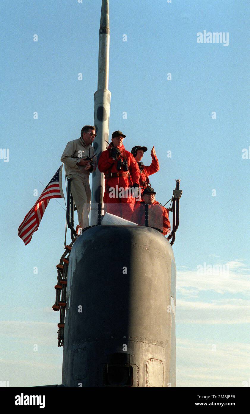 A maneuvering crew from the nuclear-powered attack submarine USS ...