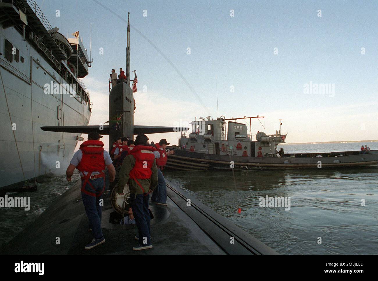 Crewmembers of the deck force of the nuclear-powered attack submarine ...
