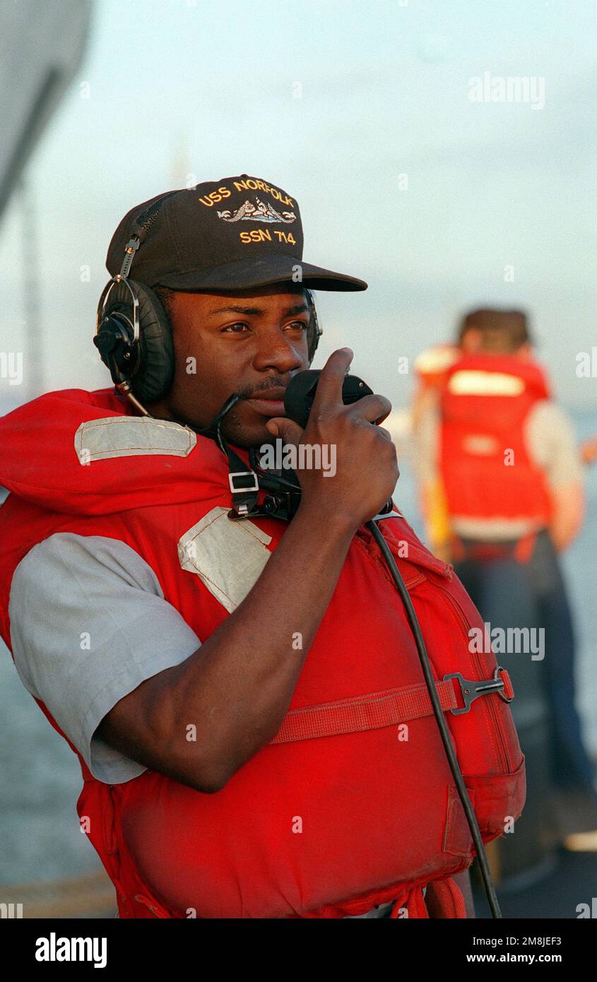 Sonar Technician Second Class (ST2) Kenneth Elmore serves as part of ...
