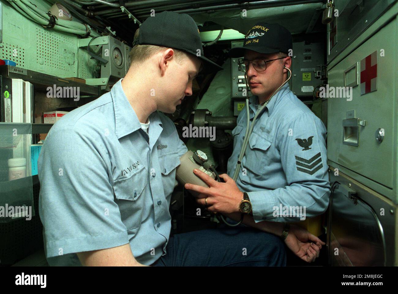 Hospital Corpsman First Class (HM1) Wayne Aldrich checks the blood ...