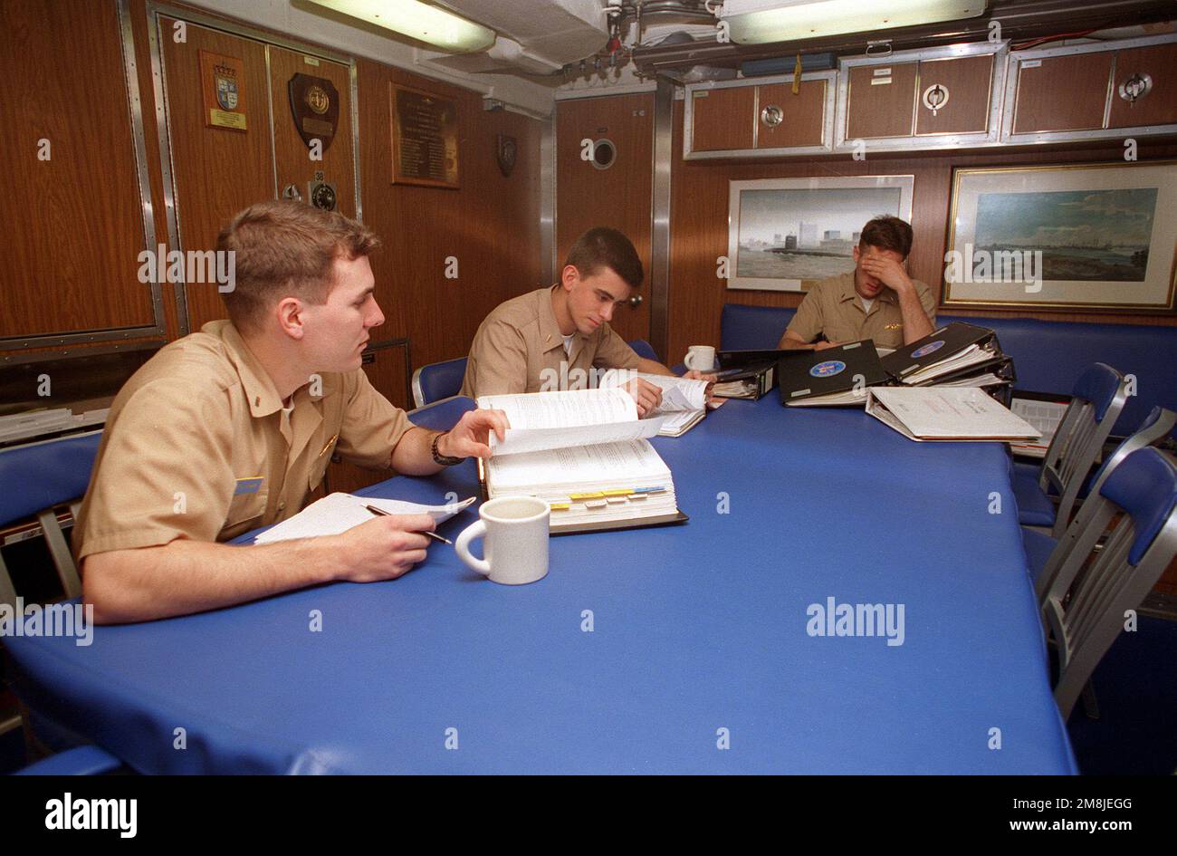 ENSIGN Joel Pastore, LTJG. Drew Rainer and LTJG. John Siekierski find ...