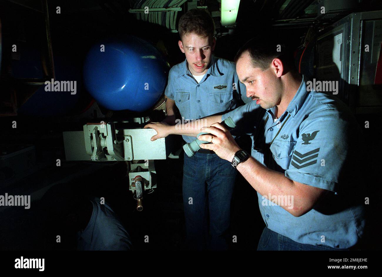 Torpedoman First Class (TM1) Glen Cote and Torpedoman SEAMAN (TMSN ...