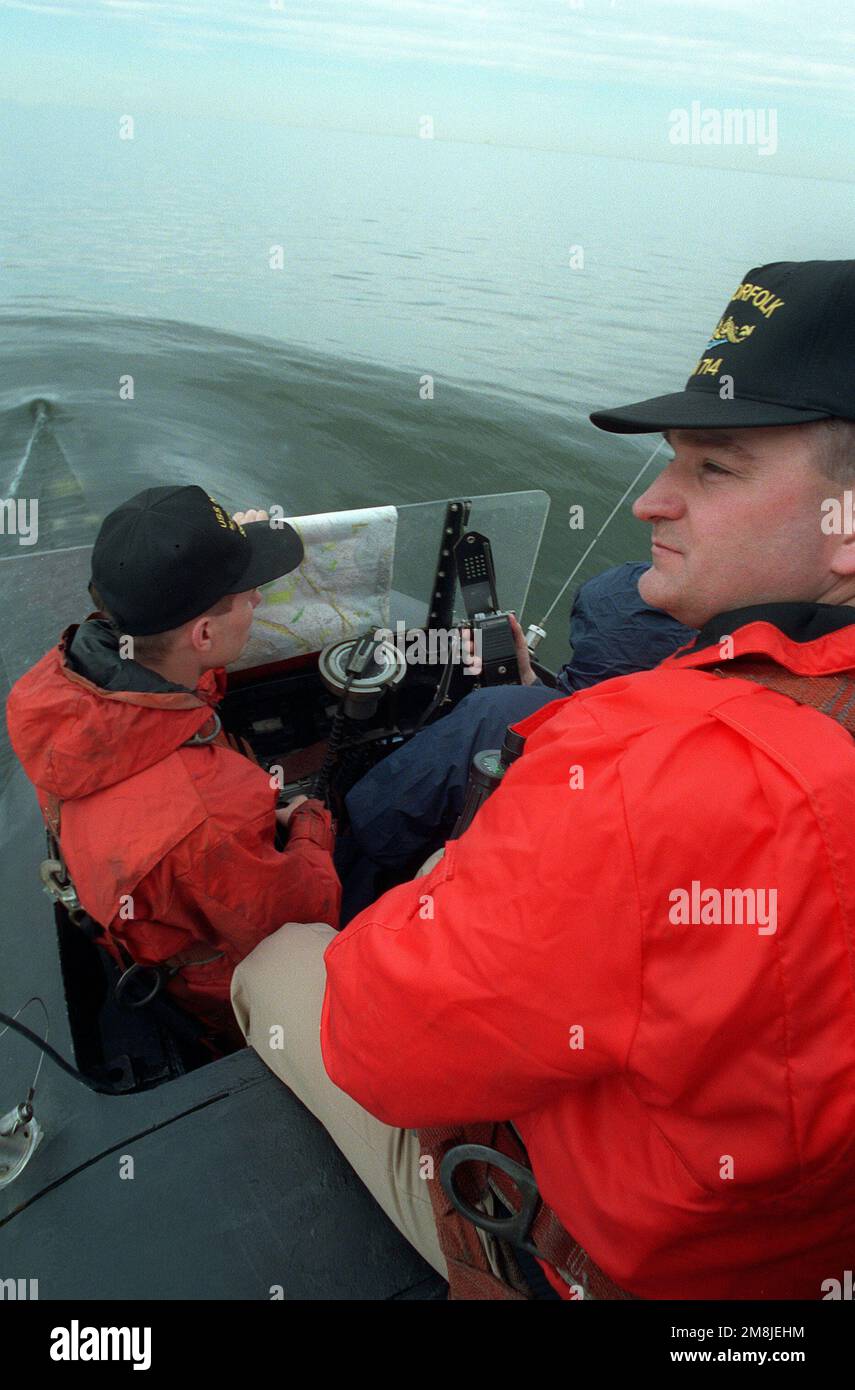 LCDR Tim Mulcare and LTJG. Drew Rainer stand the maneuvering watch on ...