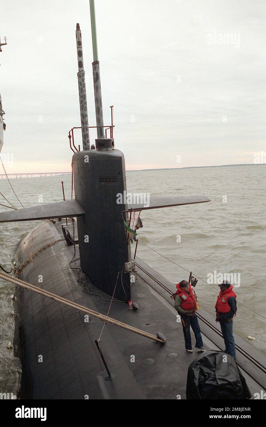 Two crewmembers of the nuclear-powered attack submarine USS NORFOLK ...