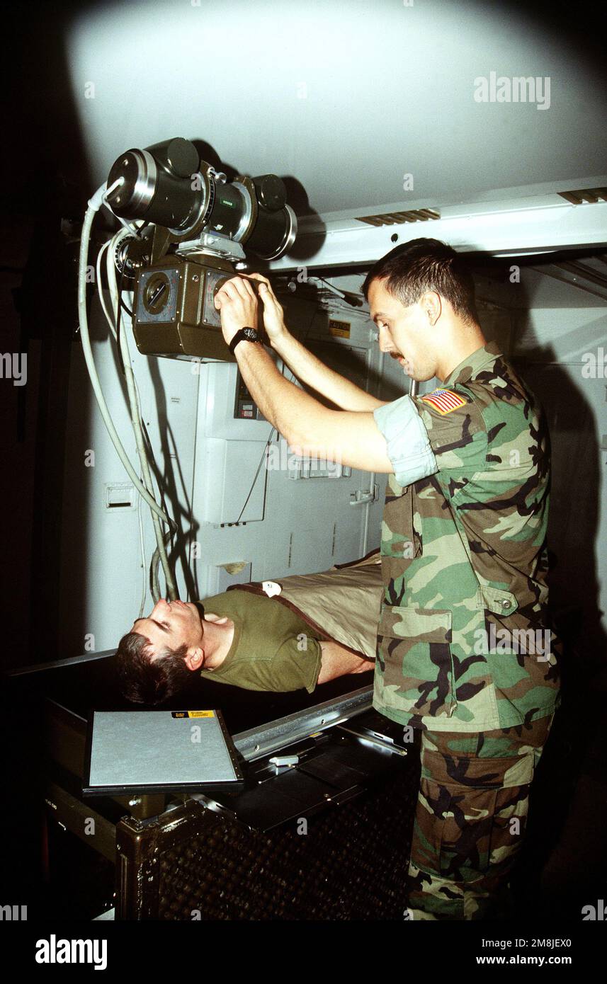 Hospital Corpsman Second Class (HM2) William Heck of Fleet Hospital ...