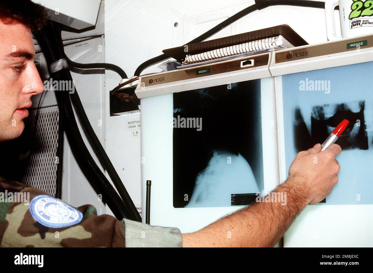 Hospital Corpsman Third Class (HM3) Jeremy Greene of Fleet Hospital ...