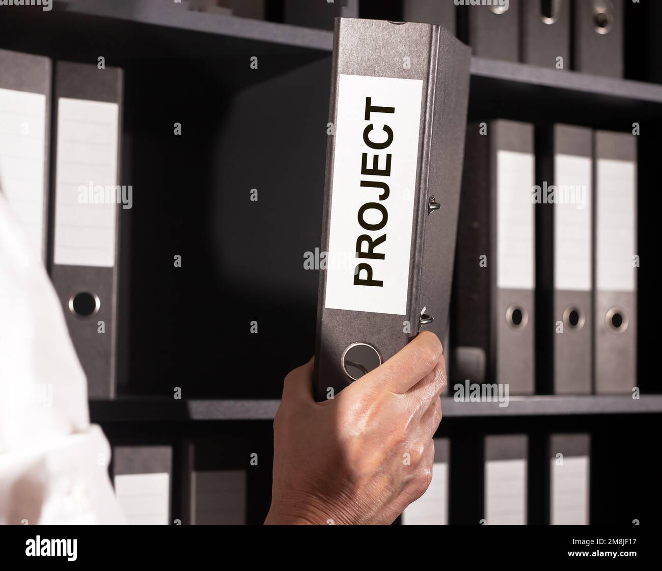 Business project concept, folder binder in hand. High quality photo ...