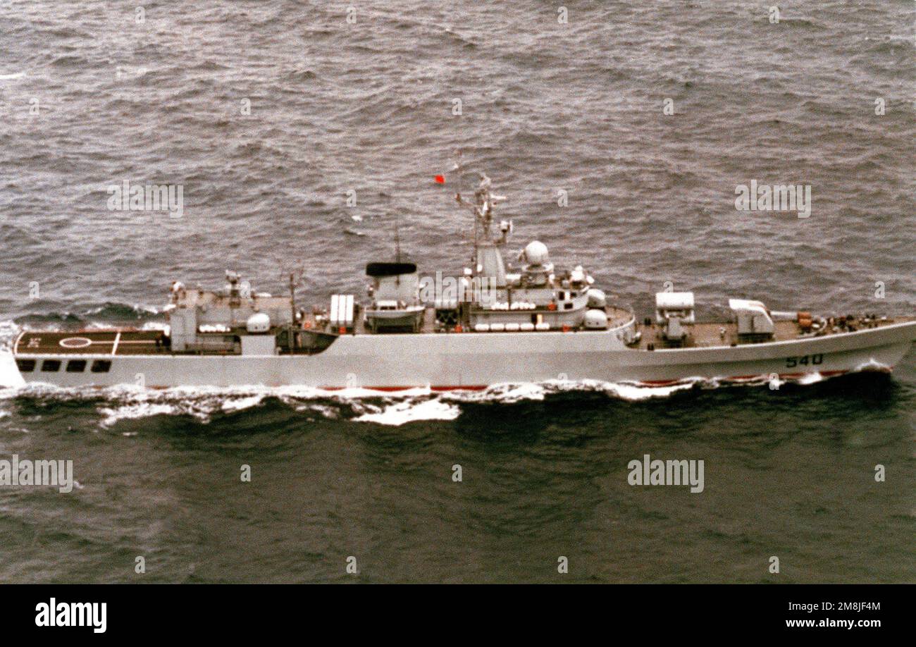 A starboard side view of the Chinese Navy Jianwei class frigate PRC ...