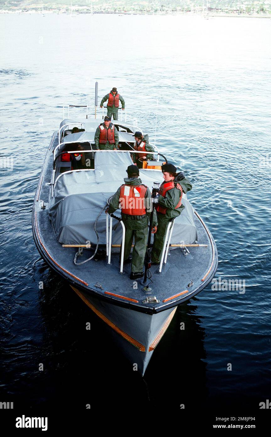 Sailors from Fleet Training Group Pacific operate one of the 50 foot ...