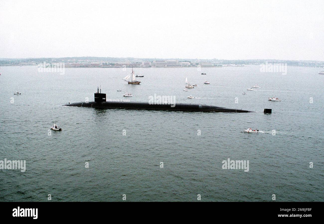 A port side view of the nuclear-powered ballistic missile submarine USS ...