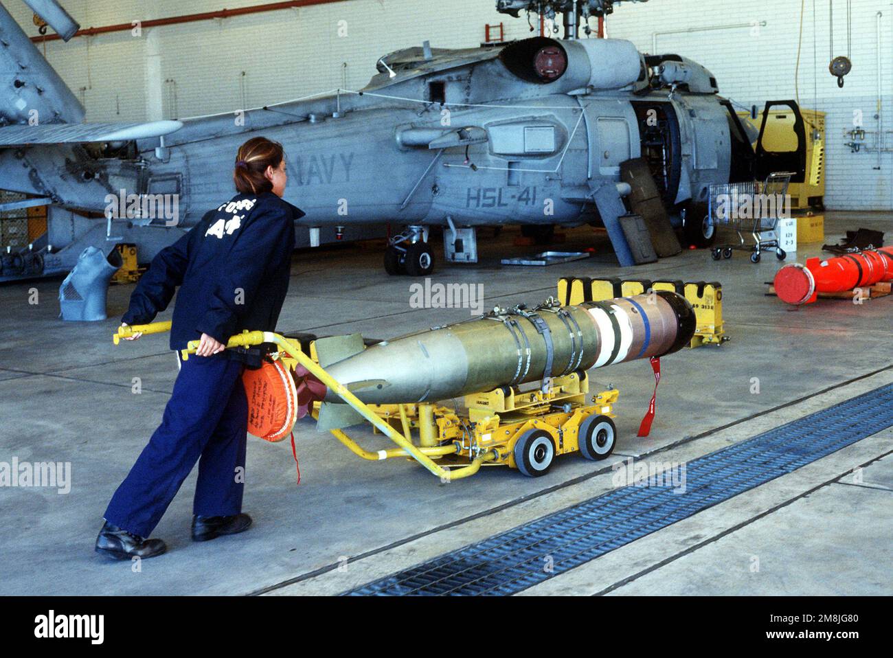 AIRMAN (AN) Thorsen of Light Helicopter Squadron Five (HSL-5) uses a ...