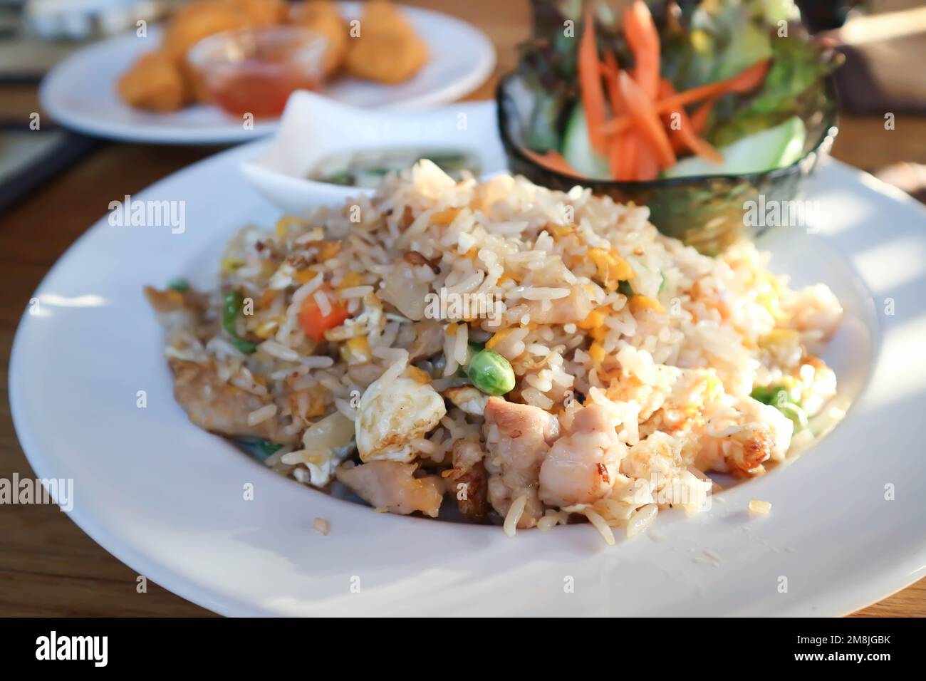 stir fried rice, fried rice with vegetable salad for serve Stock Photo ...