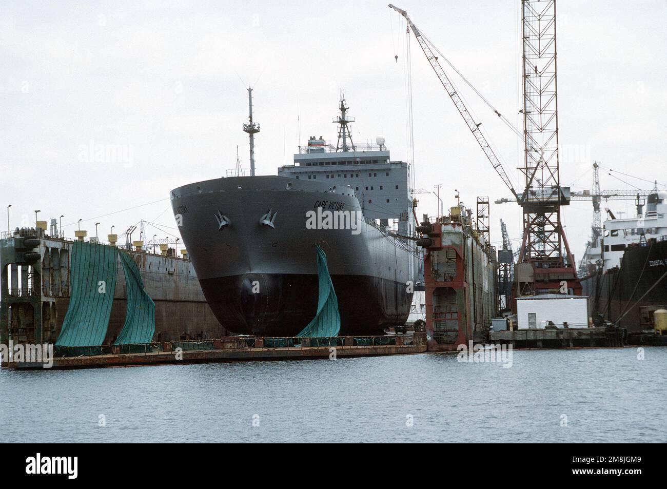 A port bow view of the Military Sealift Command (MSC) chartered cargo ...