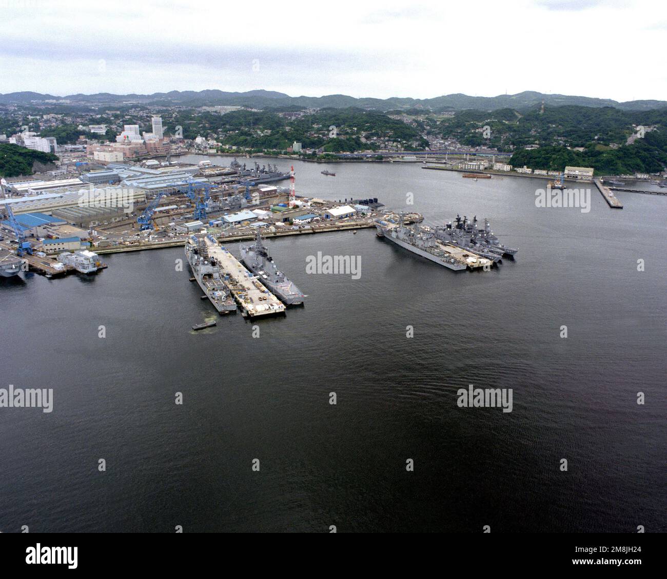 An aerial view of the U.S. Naval Ship Repair Facility at the naval base ...