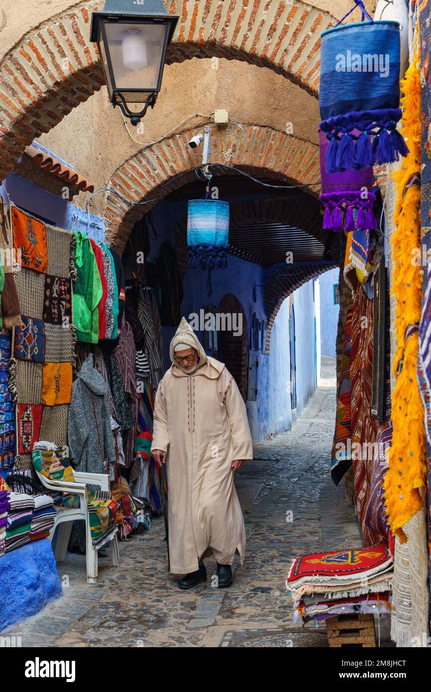 North Africa. Morocco. Chefchaouen. An old man dressed in a bournous ...