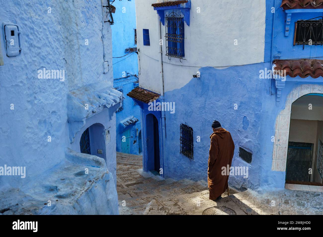 North Africa. Morocco. Chefchaouen. An old man dressed in a bournous ...