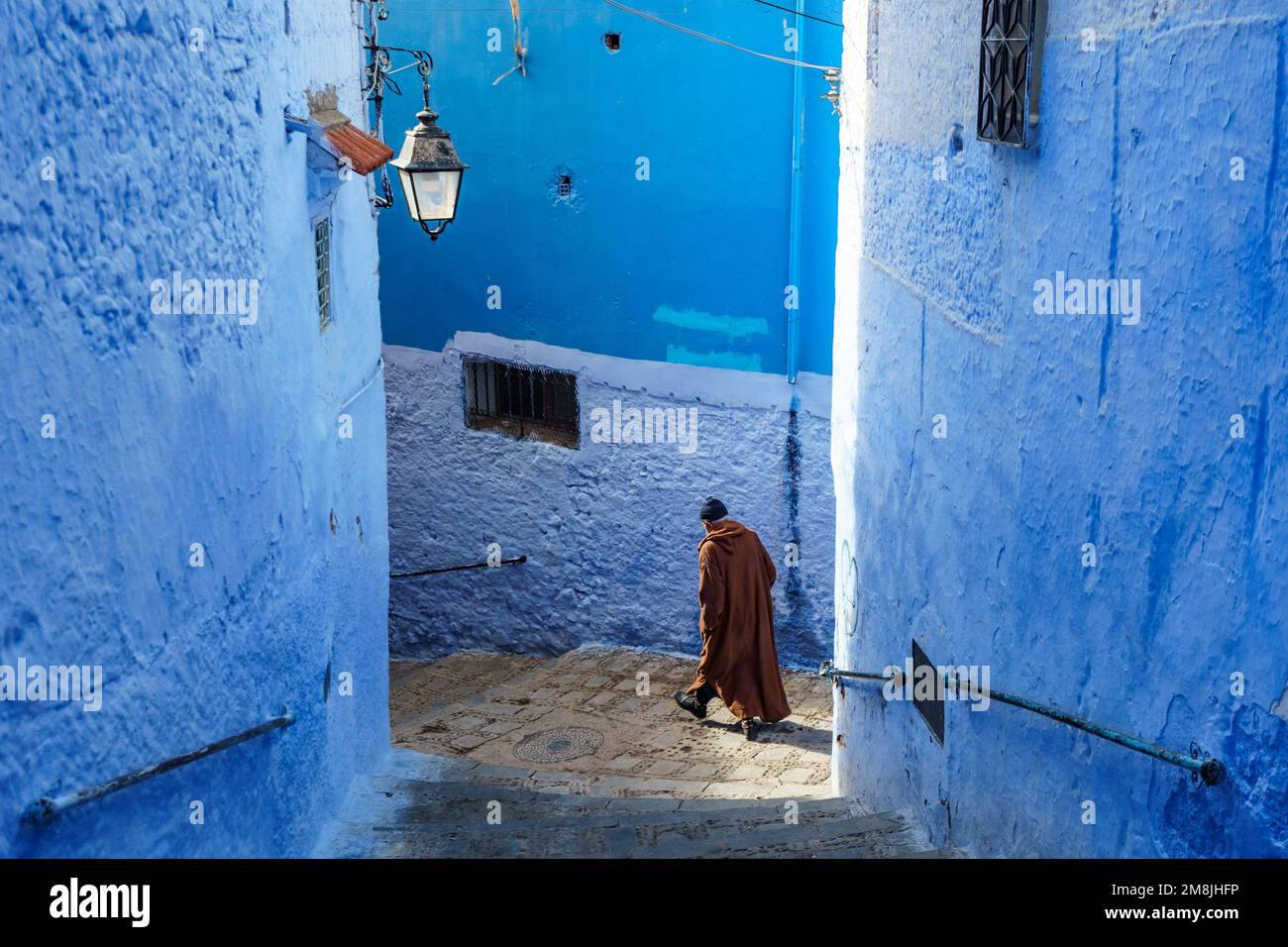 North Africa. Morocco. Chefchaouen. An old man dressed in a bournous ...