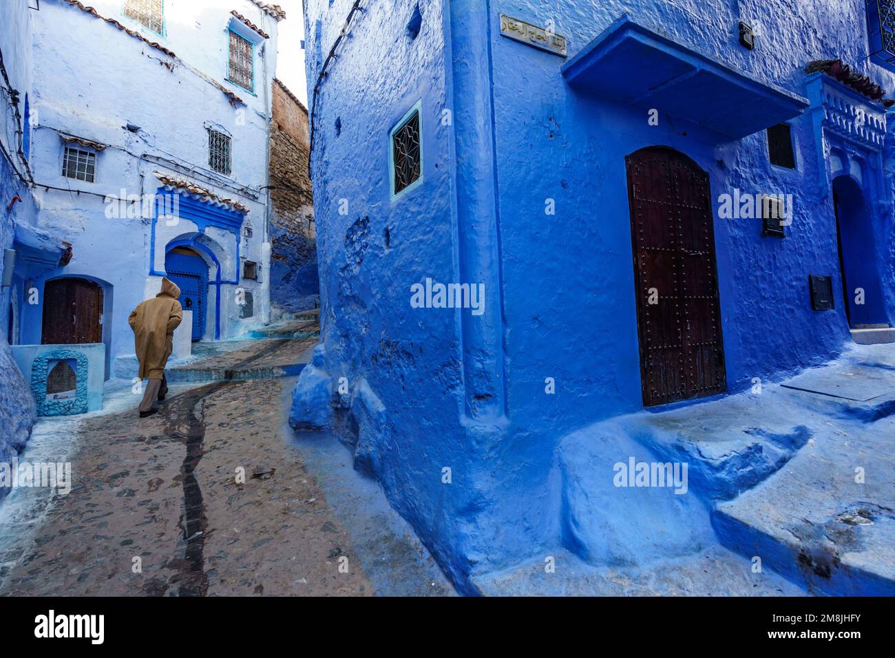 North Africa. Morocco. Chefchaouen. An old man dressed in a bournous ...
