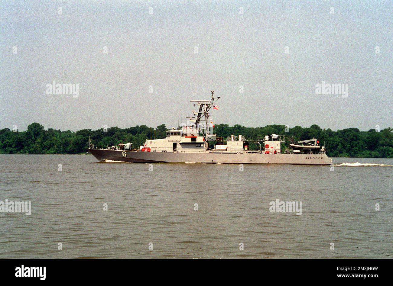 A port side view of the coastal patrol boat USS SIROCCO (PC-6) as the ...