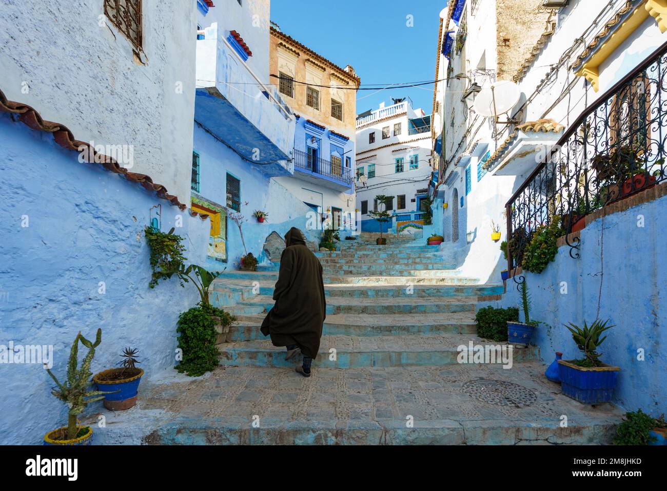 North Africa. Morocco. Chefchaouen. An old man dressed in a bournous ...