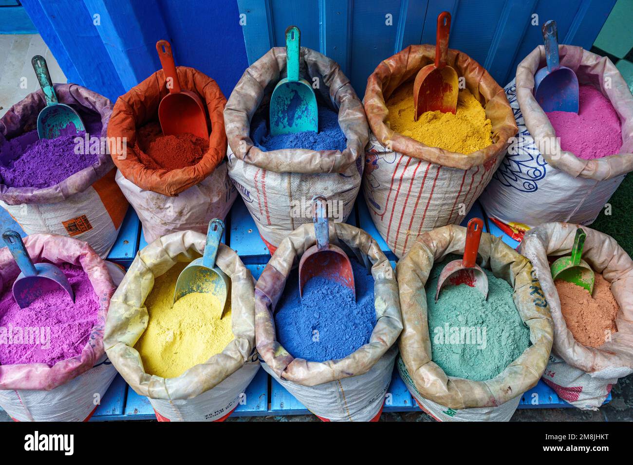 North Africa. Morocco. Chefchaouen. Bags of multicolored powder ...