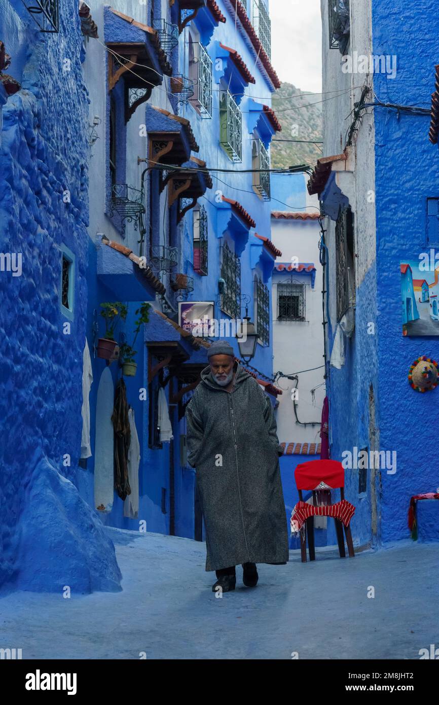 North Africa. Morocco. Chefchaouen. An old man dressed in a bournous ...