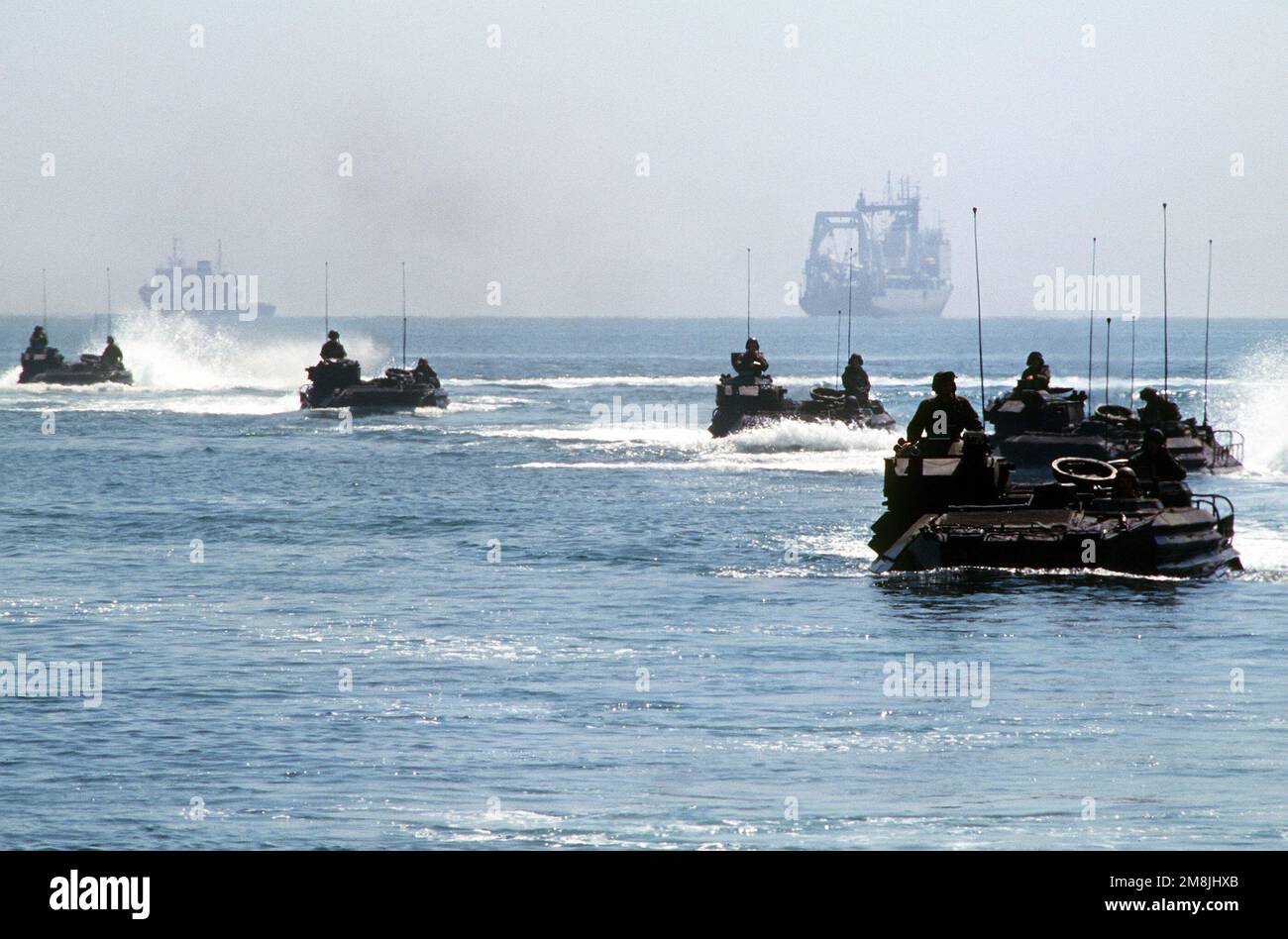 Amphibious assault vehicles (AAV) driven by Marines from the 3rd USMC ...
